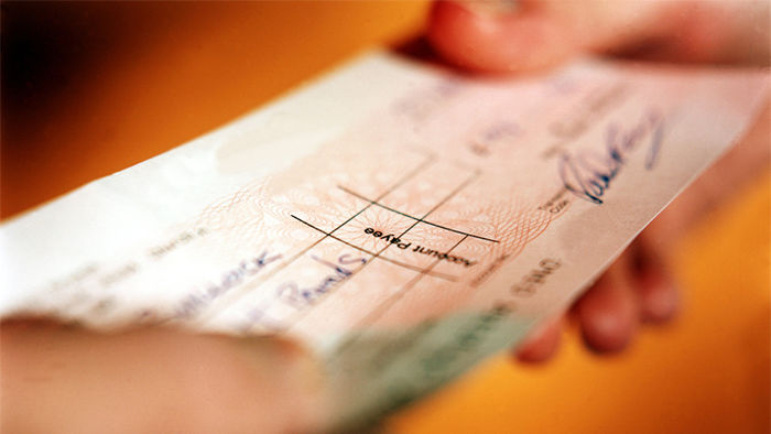 Why does it take so long for cheques to clear? | Money magazine